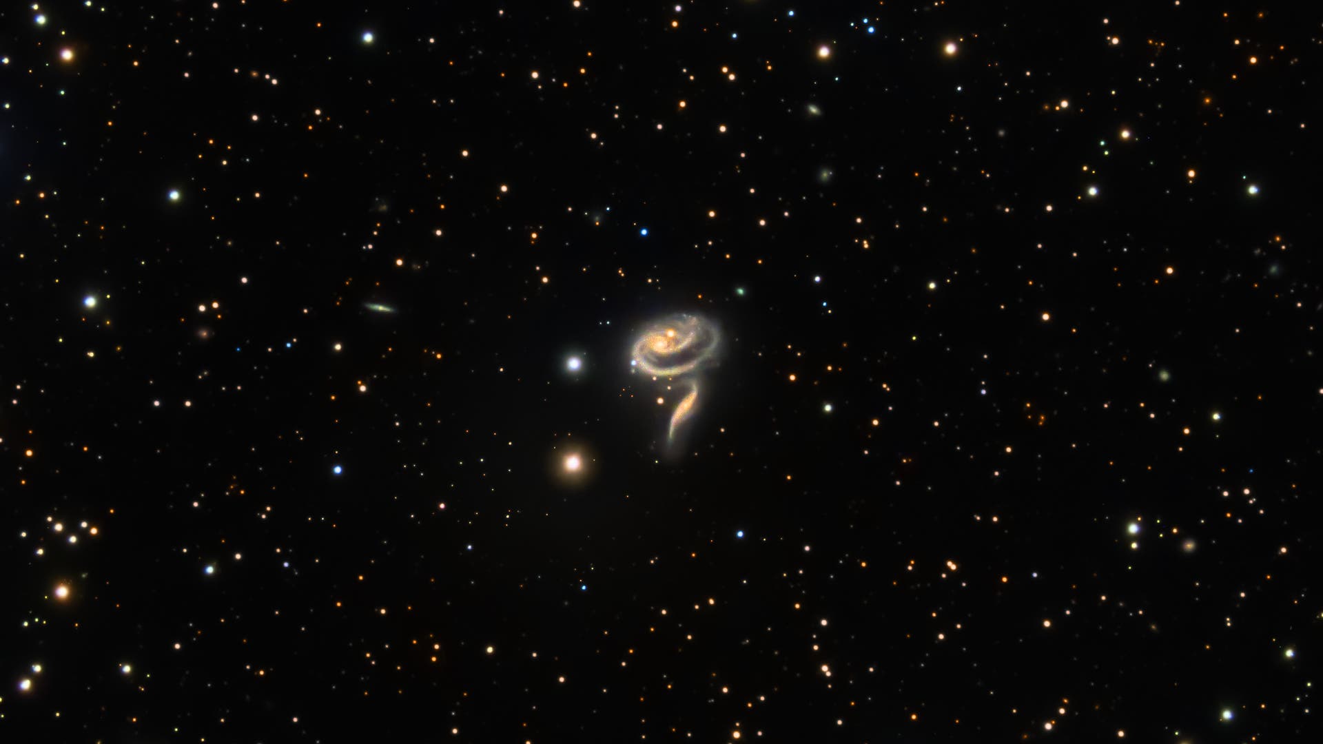 Arp 273 - The Cosmic Rose - Spektrum der Wissenschaft