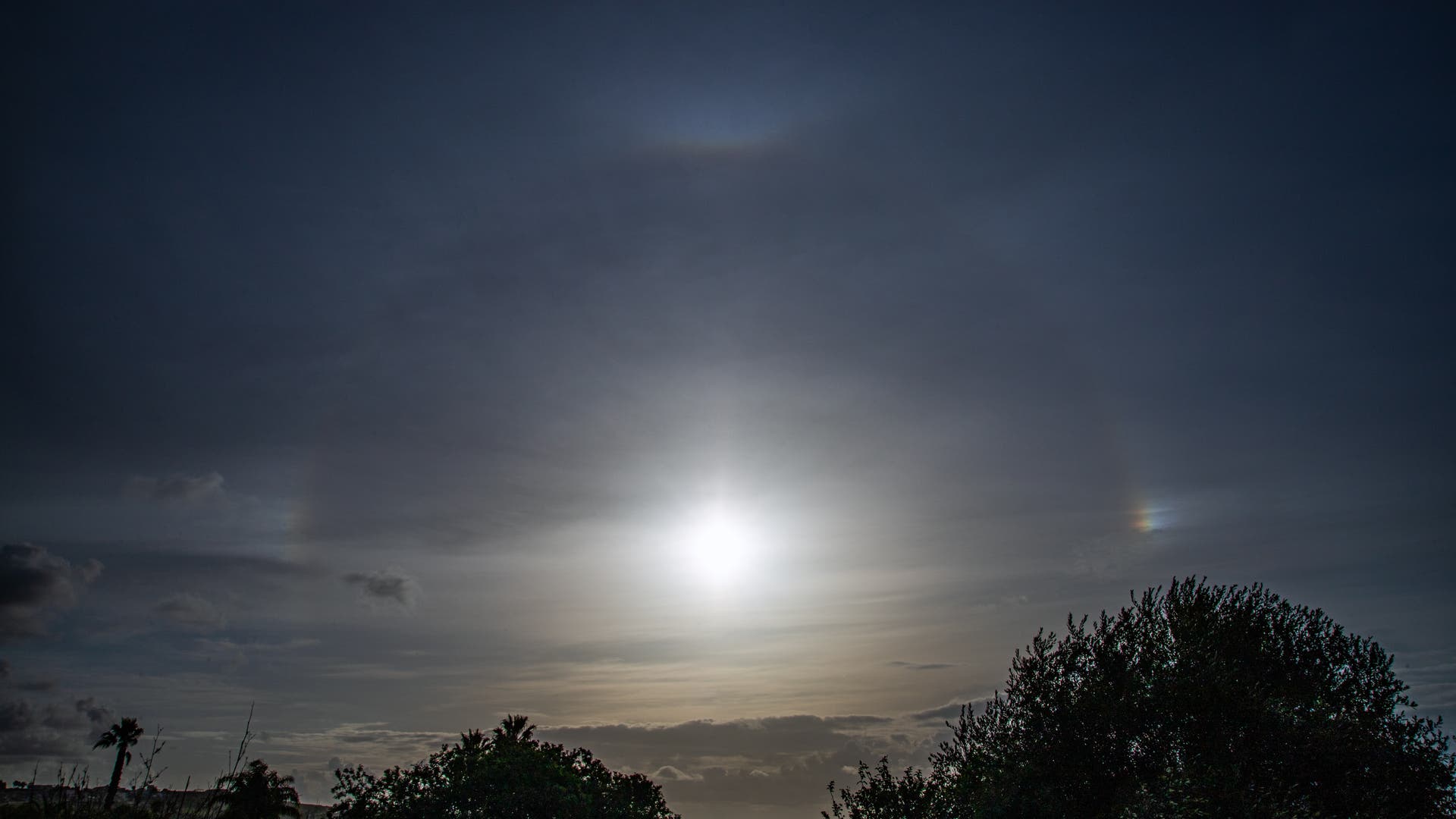After the storm: the sun, Sun dogs, 22° halo and circumzenithal arc ...