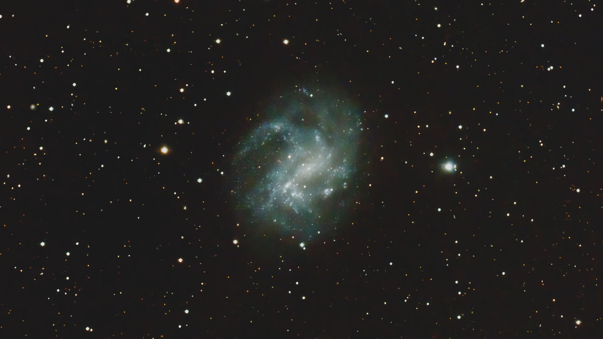 NGC 4395, NGC 4399, NGC 4400, NGC 4401 - Spektrum der Wissenschaft