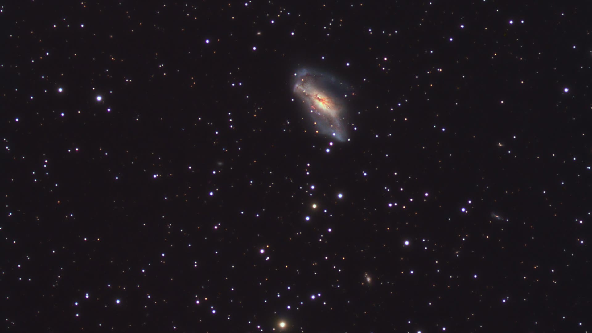 NGC 2146/2146A - Spektrum der Wissenschaft