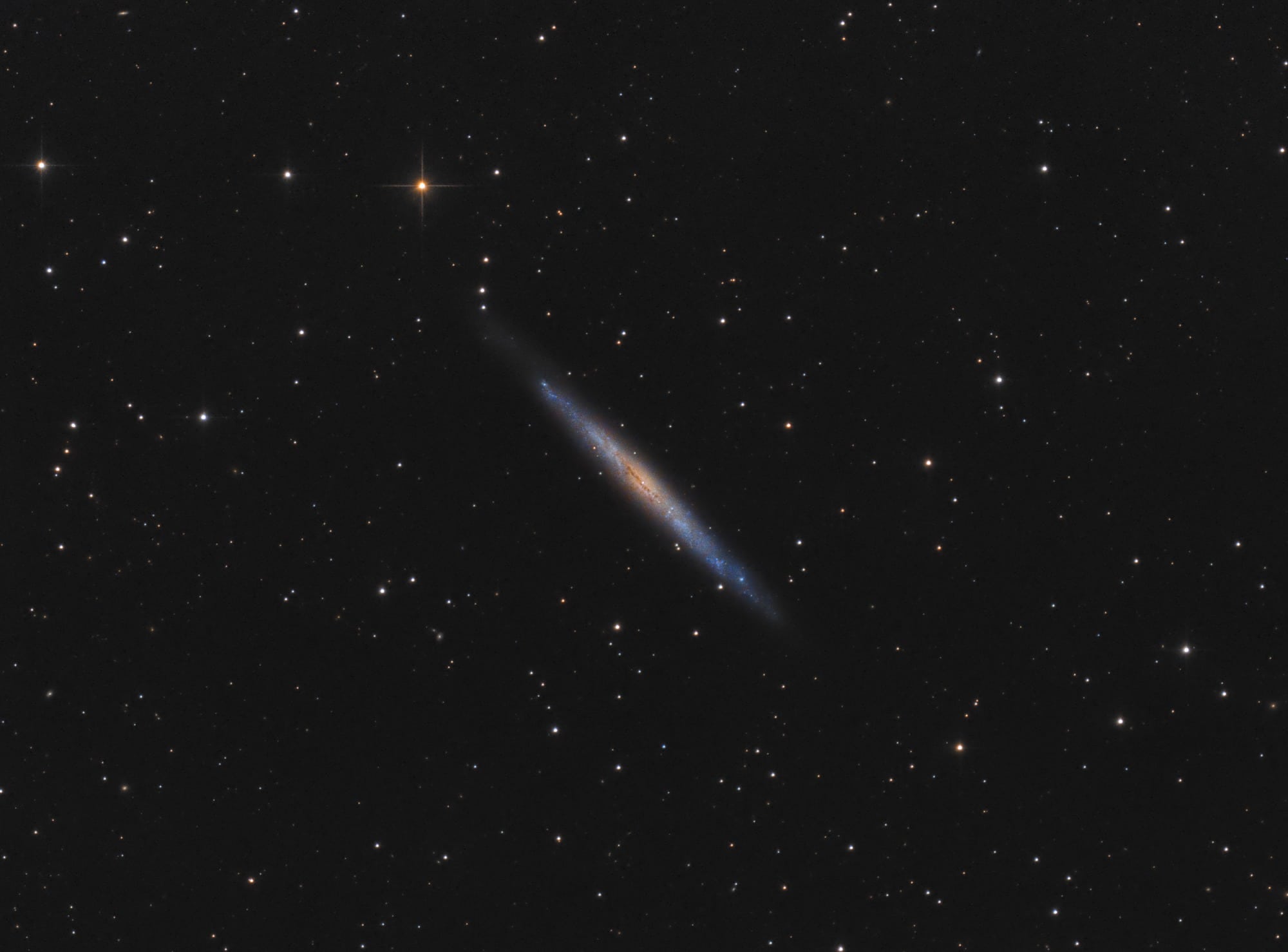 NGC 4244, die "Silbernadel"-Galaxie - Spektrum der Wissenschaft